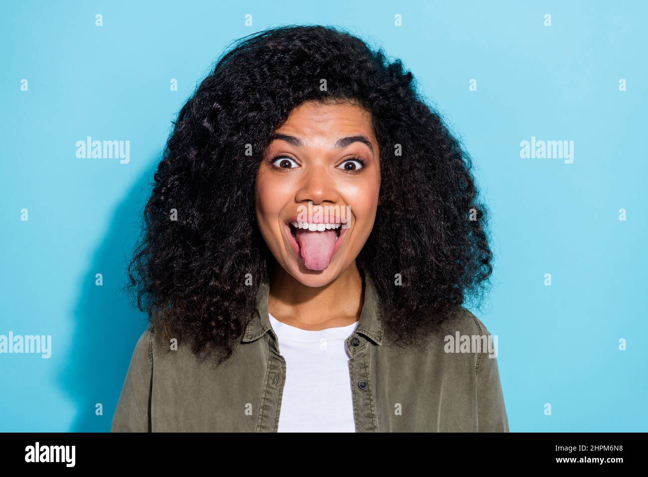 Photo of young lovely african girl have fun fool stick-out childish ...