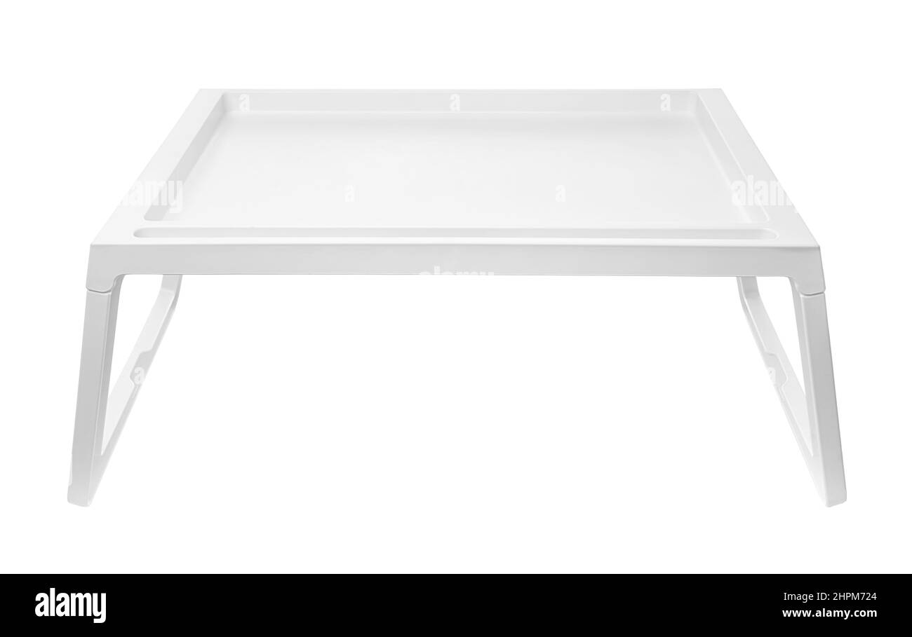 Table-tray that unfolds. White color Stock Photo - Alamy