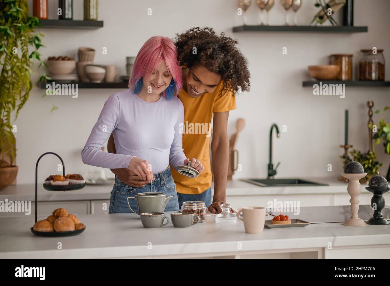 Young male making tea hi-res stock photography and images - Alamy