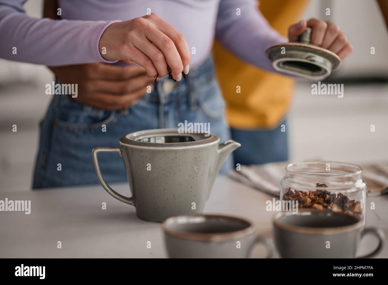 Young male making tea hi-res stock photography and images - Alamy