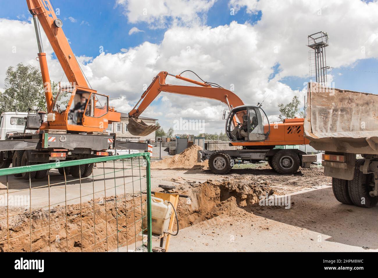 Excavator digging heavy earth work on an industrial machine on a ...