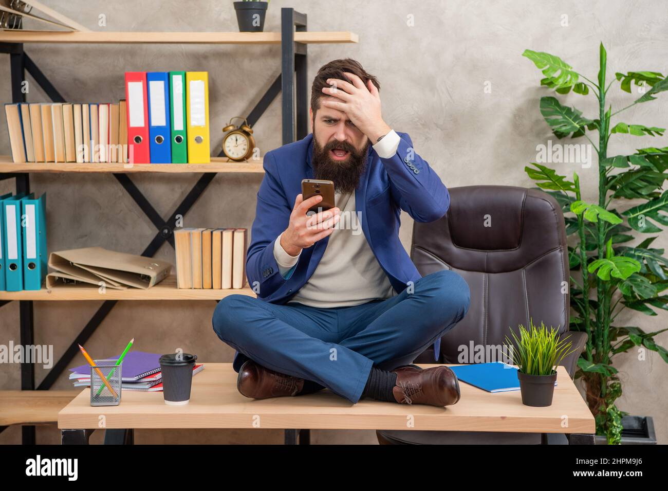 Oh no. Stressed businessman read sms. Panic attack from work stress ...