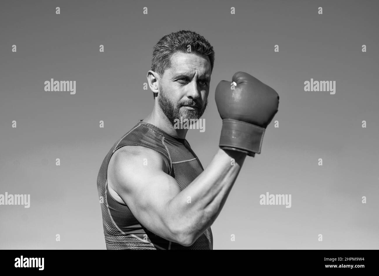 knockout. man boxer punching. fitness gym outdoor. muscular athletic ...