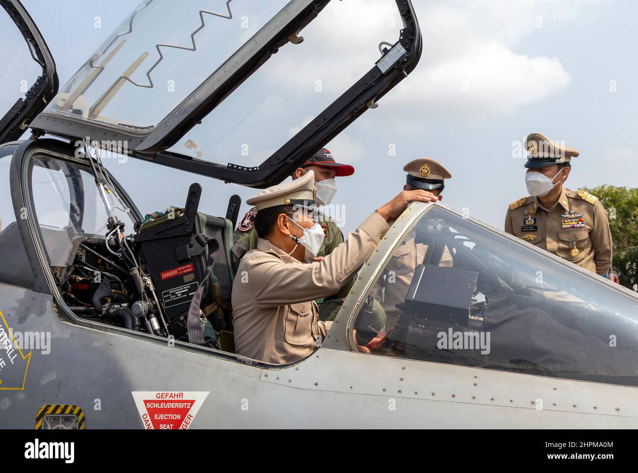 Officials from the Royal Rainmaking and Agricultural Aviation ...