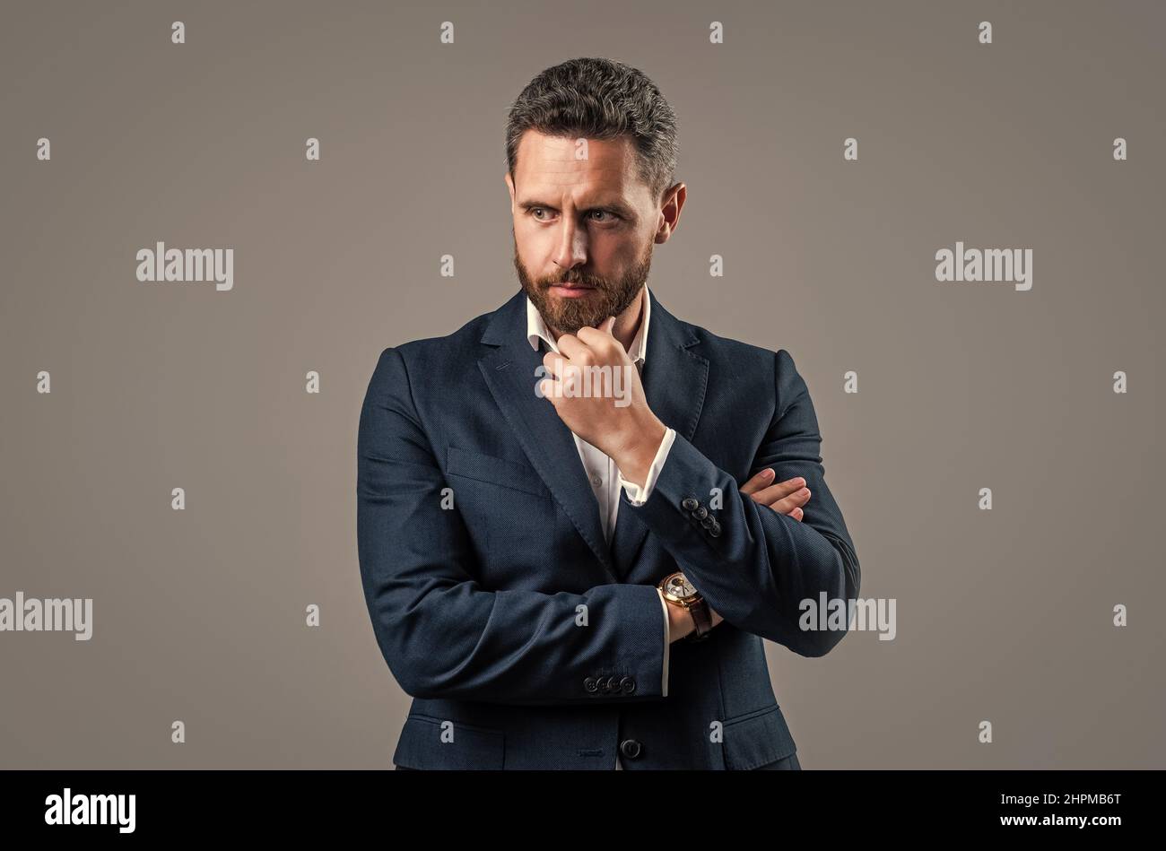 Manage Everything. male fashion accessory. man in jacket on grey ...