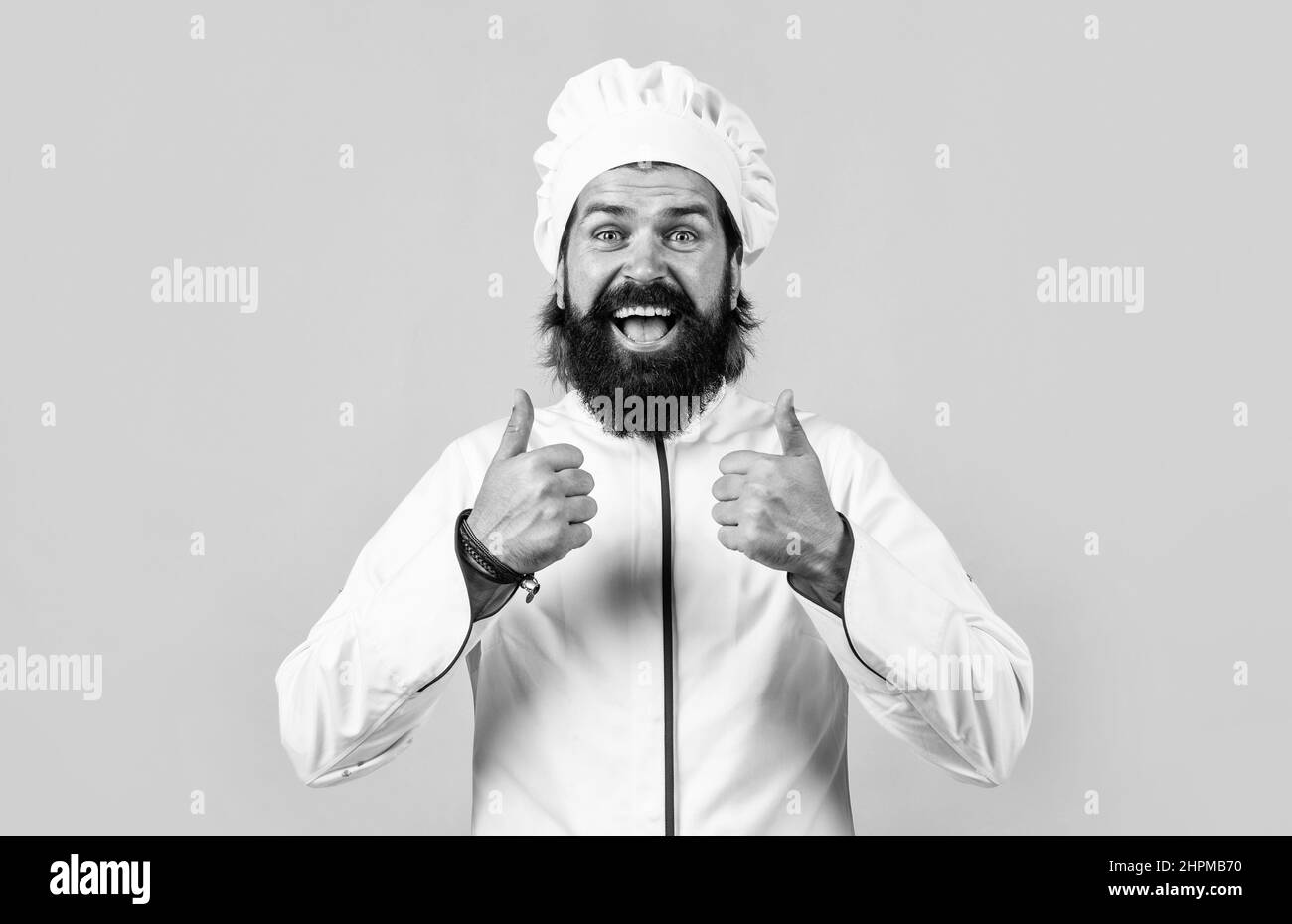 best of best. male chef in hat prepare healthy meal. handsome man with ...