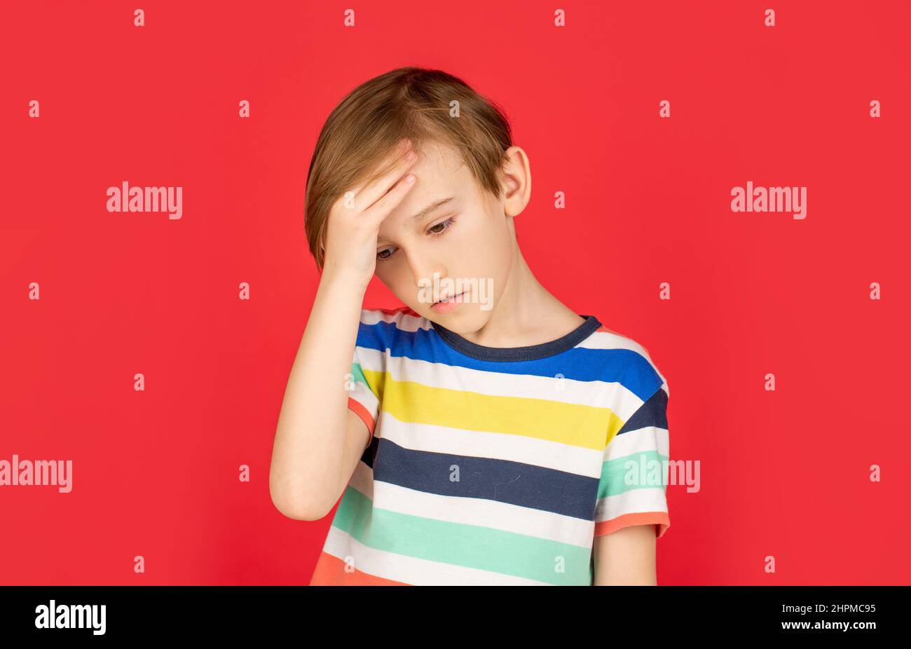 Little boy having a headache. Despair, tragedy. Headache child ...
