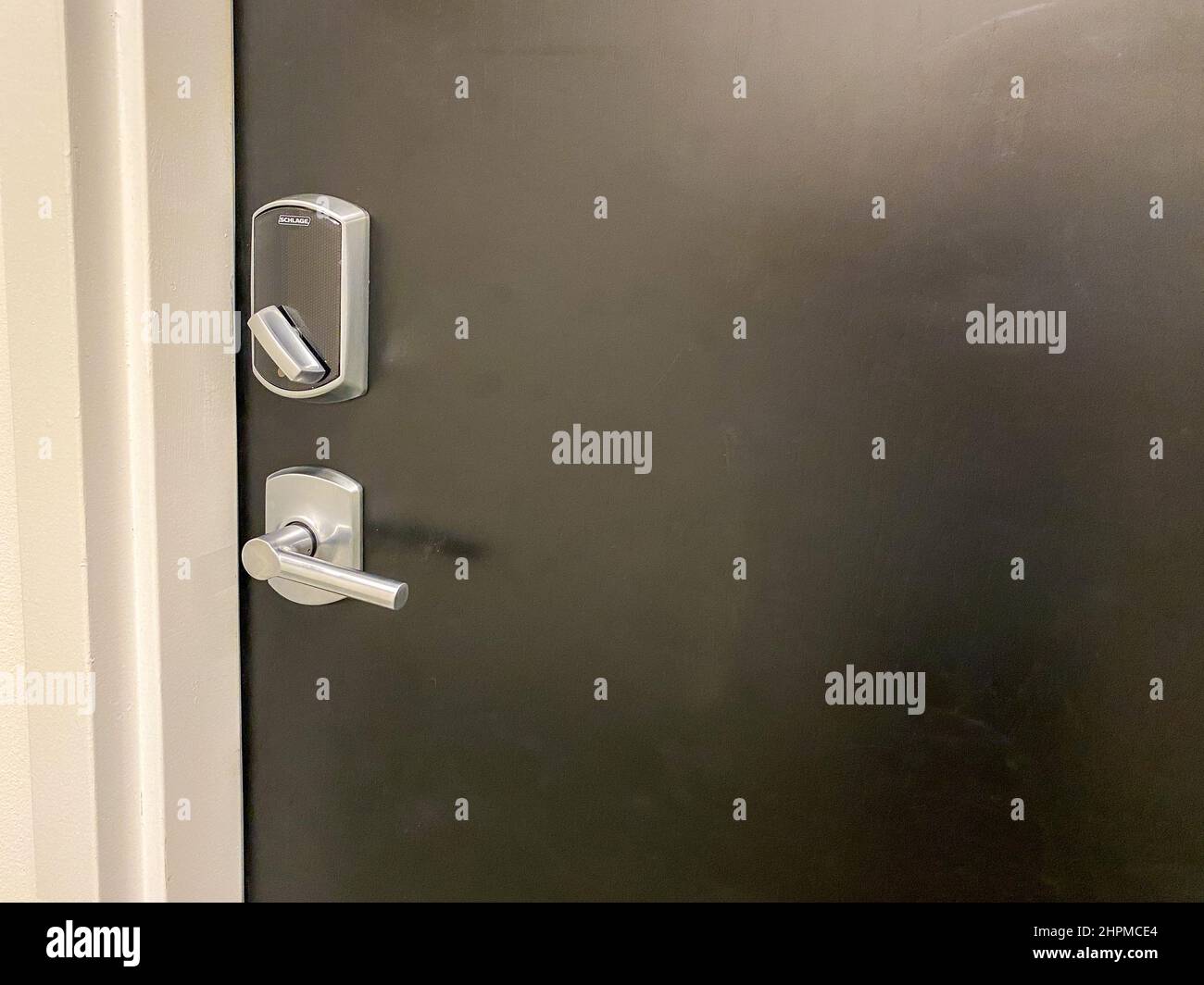 Orlando, FL USA - August 5 2020: A smart lock on an apartment building ...