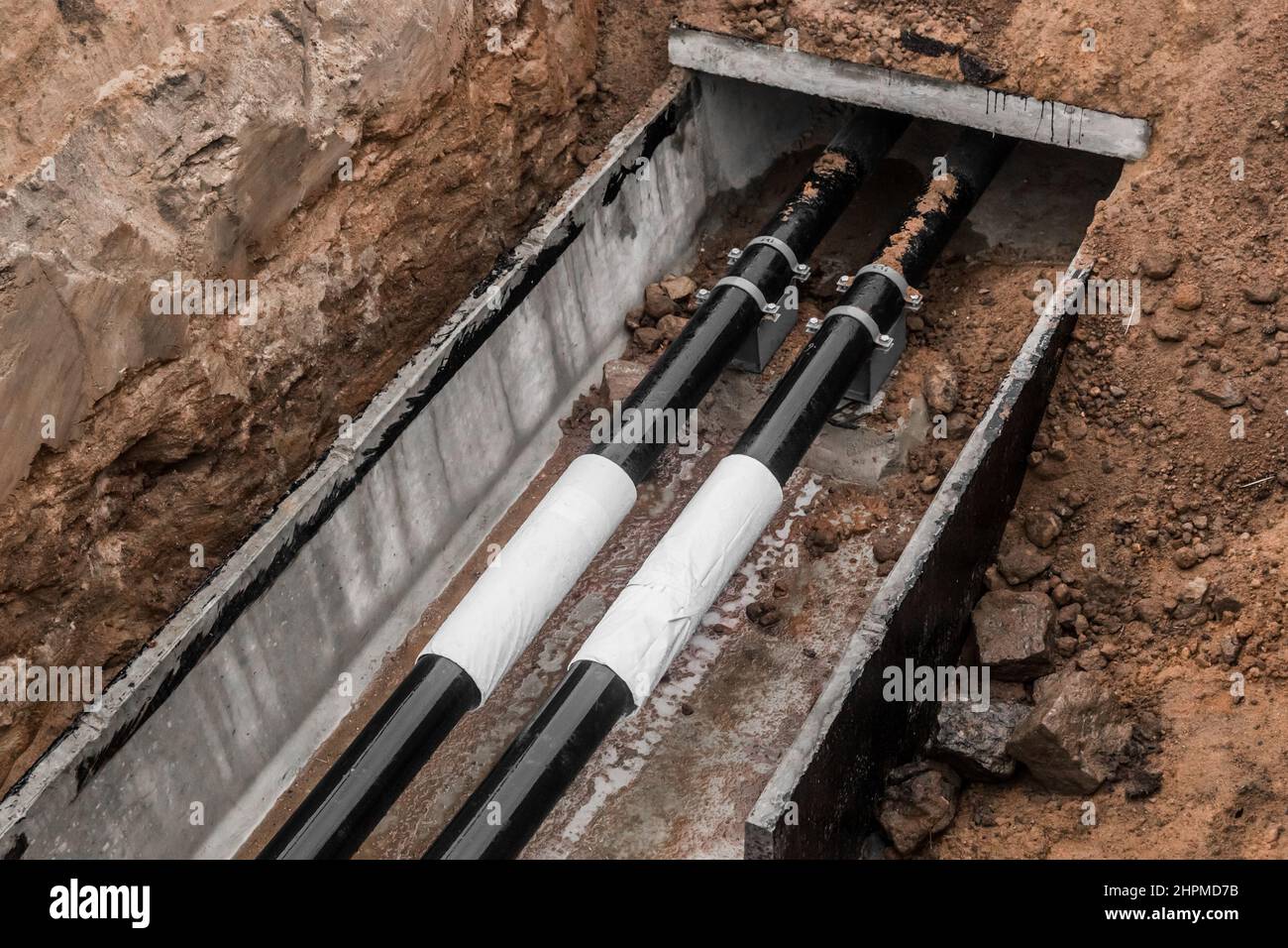 Repair of the water line of the heating main pipe in the ground trench ...
