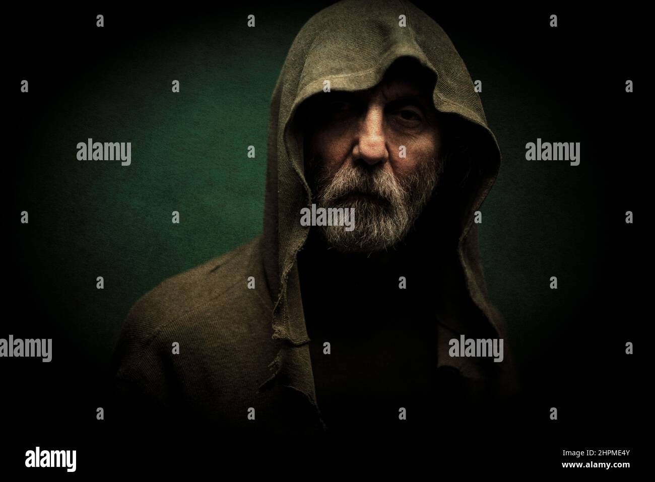 Hooded old man hi-res stock photography and images - Alamy