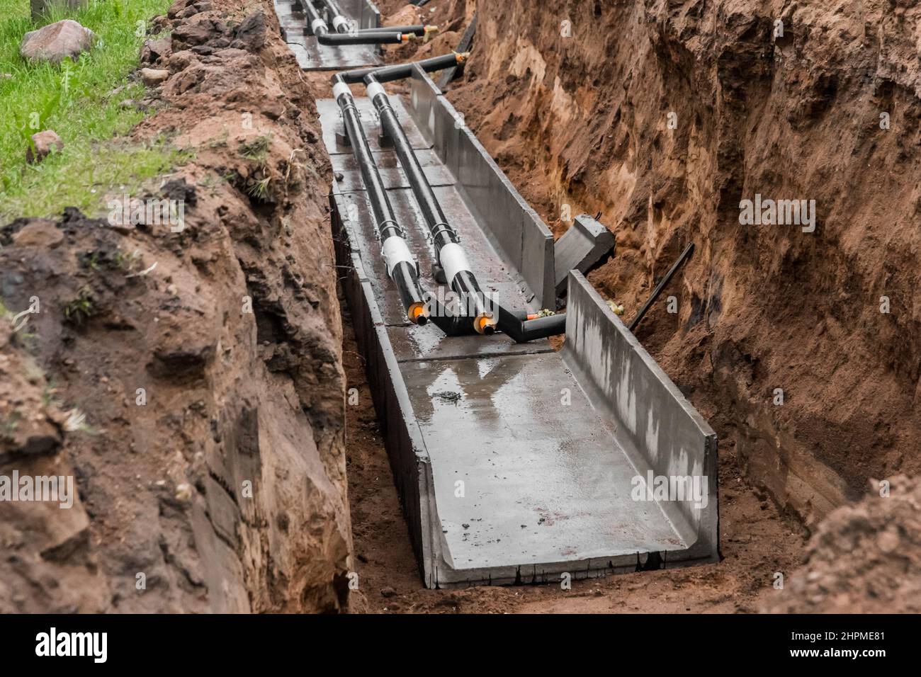 Repair of the water line of the heating main pipe in the ground trench ...