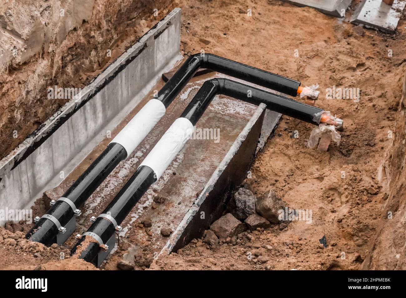 Repair of the water line of the heating main pipe in the ground trench ...