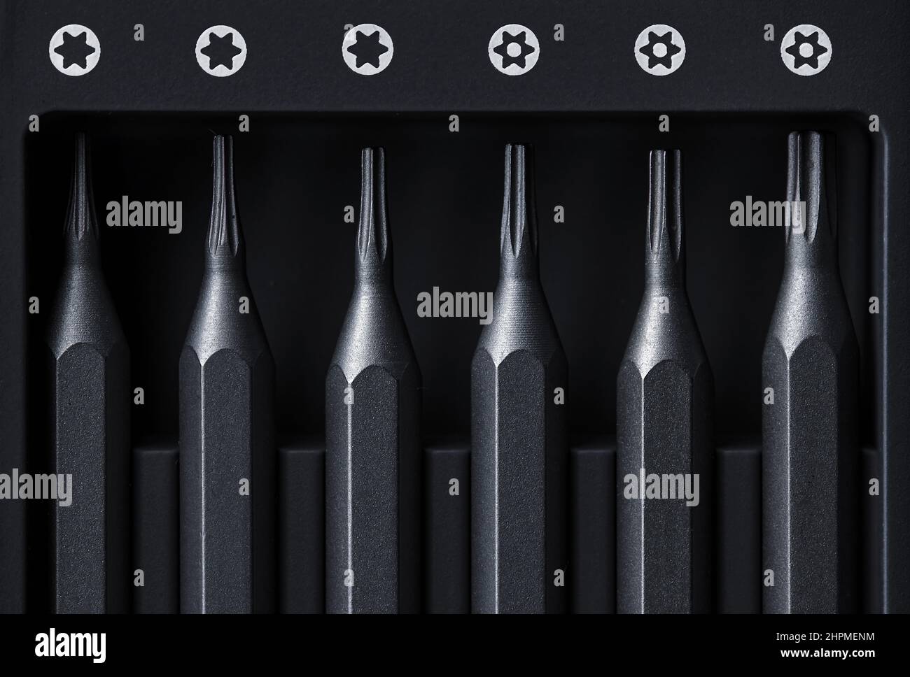 Screwdriver tips different shapes and sizes close up. Manual metal mini ...