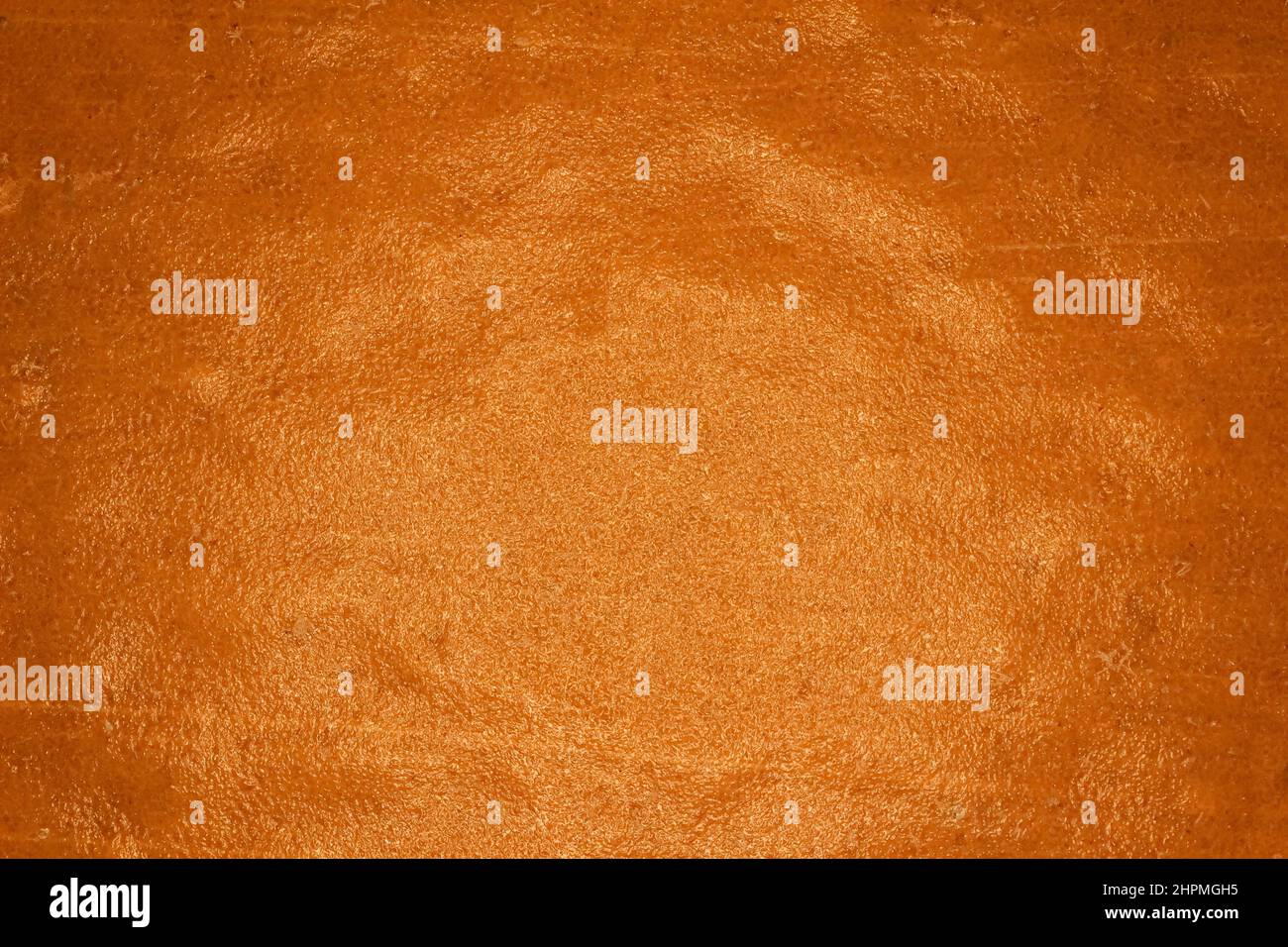 Photo of orange toned frozen ice surface texture Stock Photo - Alamy