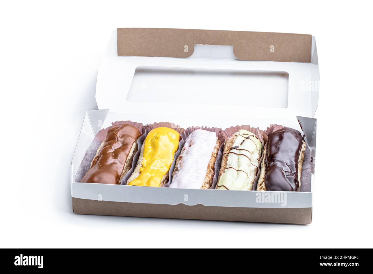 Set of decorated eclairs in paper box isolated on white Stock Photo - Alamy