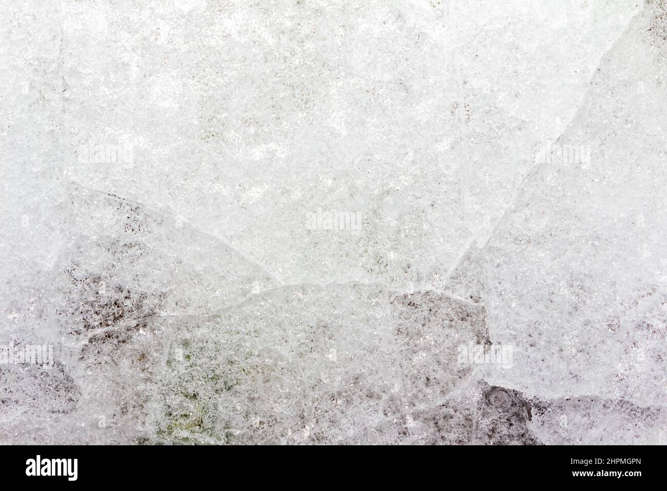 Photo of frozen cracked snow with ice surface texture background Stock ...