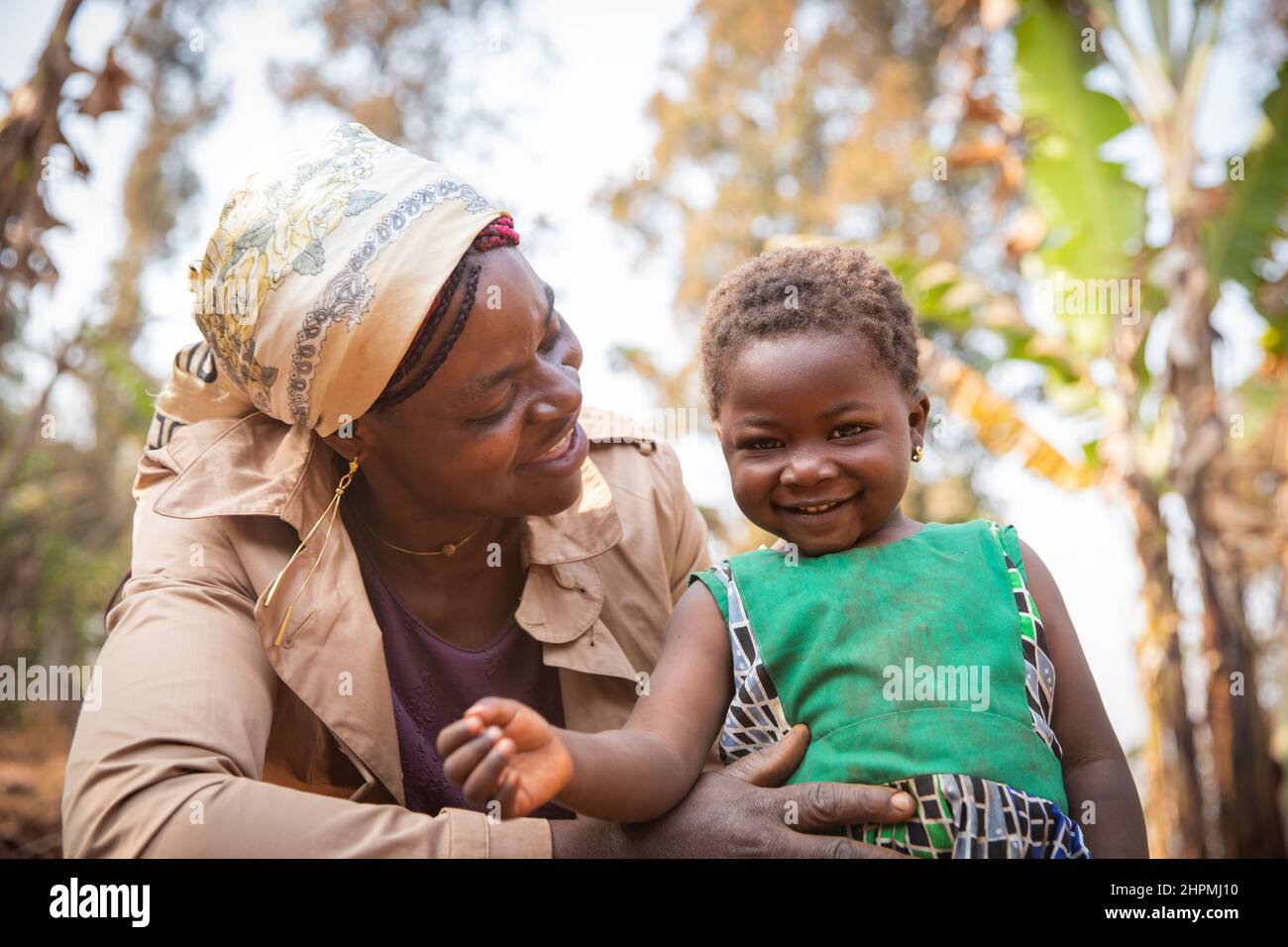 Moment of love and tenderness between African mother and daughter ...