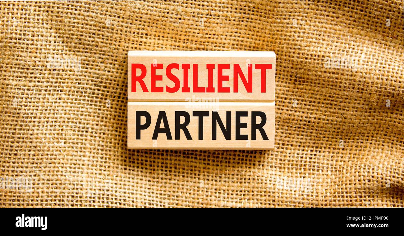 Resilient partner symbol. Concept words Resilient partner on wooden ...