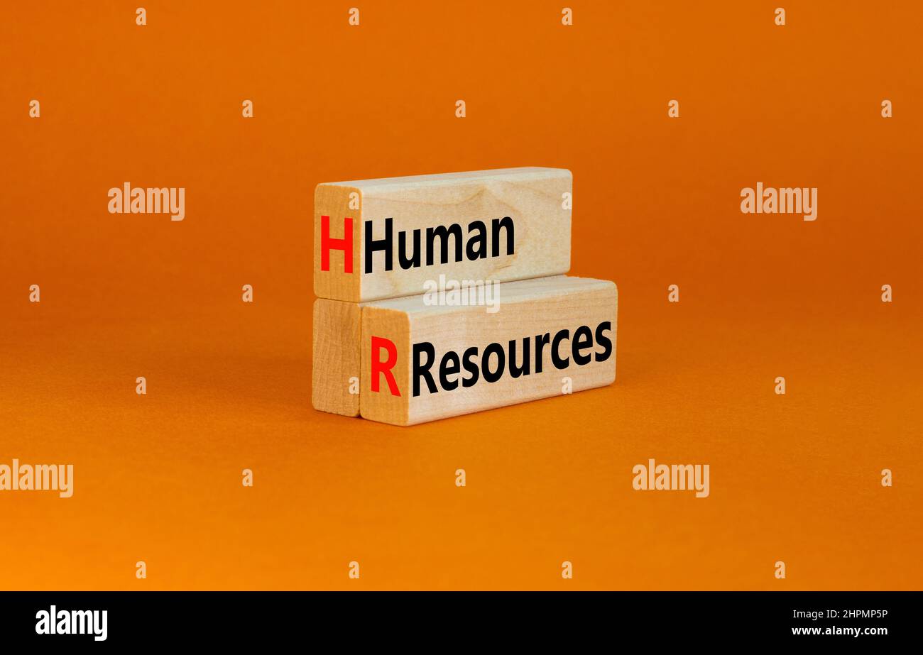 HR Human resources symbol. Concept words HR Human resources on wooden ...