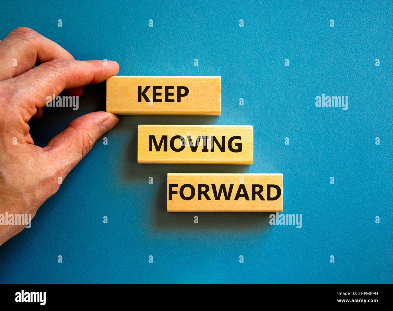 Keep moving forward symbol. Concept words Keep moving forward on blocks ...
