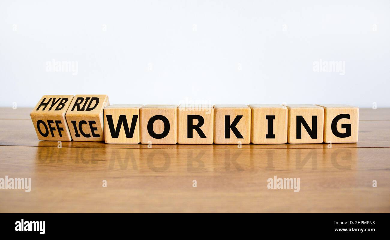 Hybrid or office working symbol. Turned wooden cubes and changed words ...