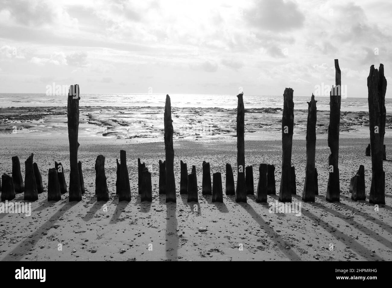 Pett Level Beach with its commanding cliff face and submerged pre ...