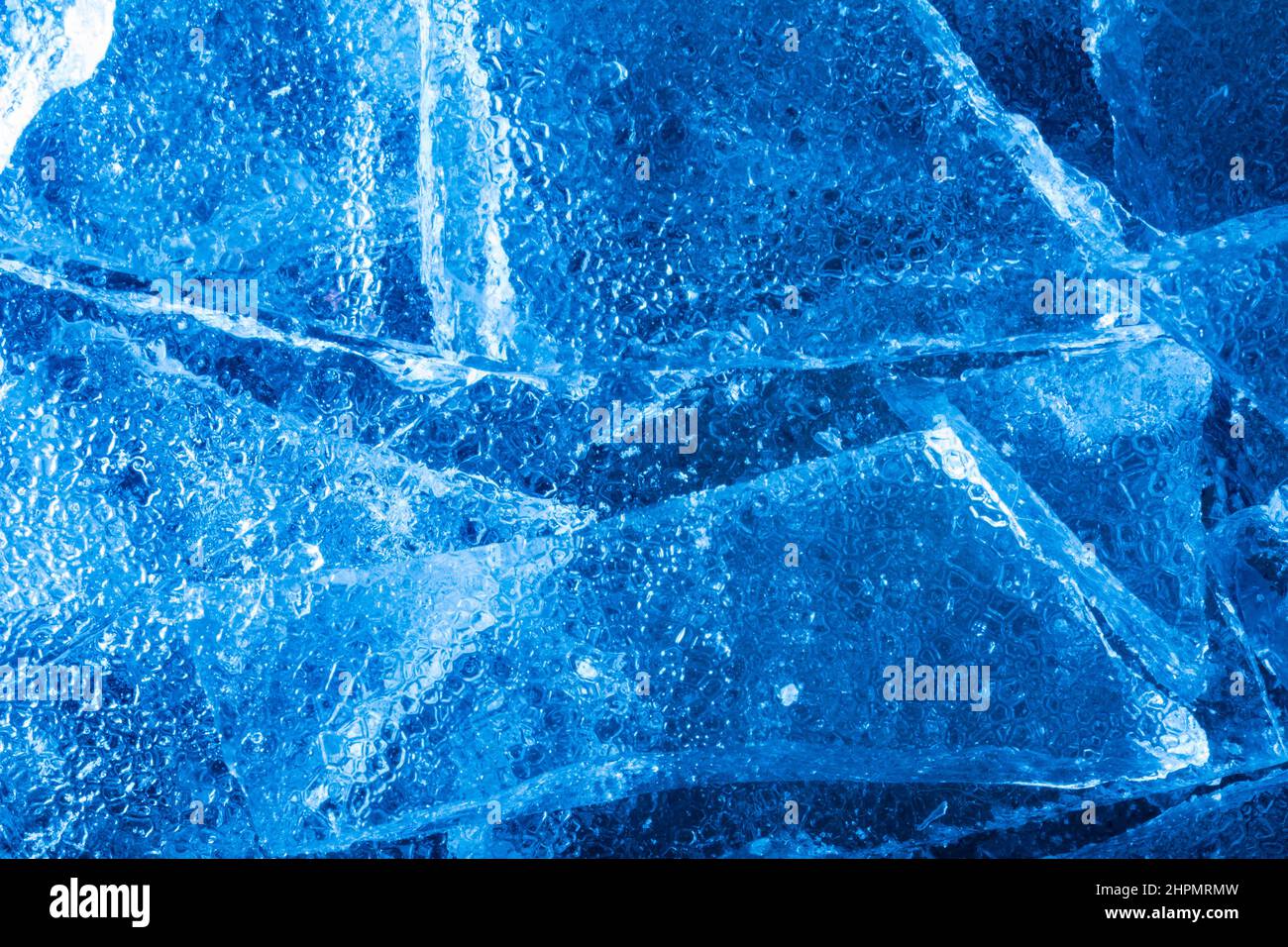Photo of blue toned frozen cracked ice pieces surface texture Stock ...