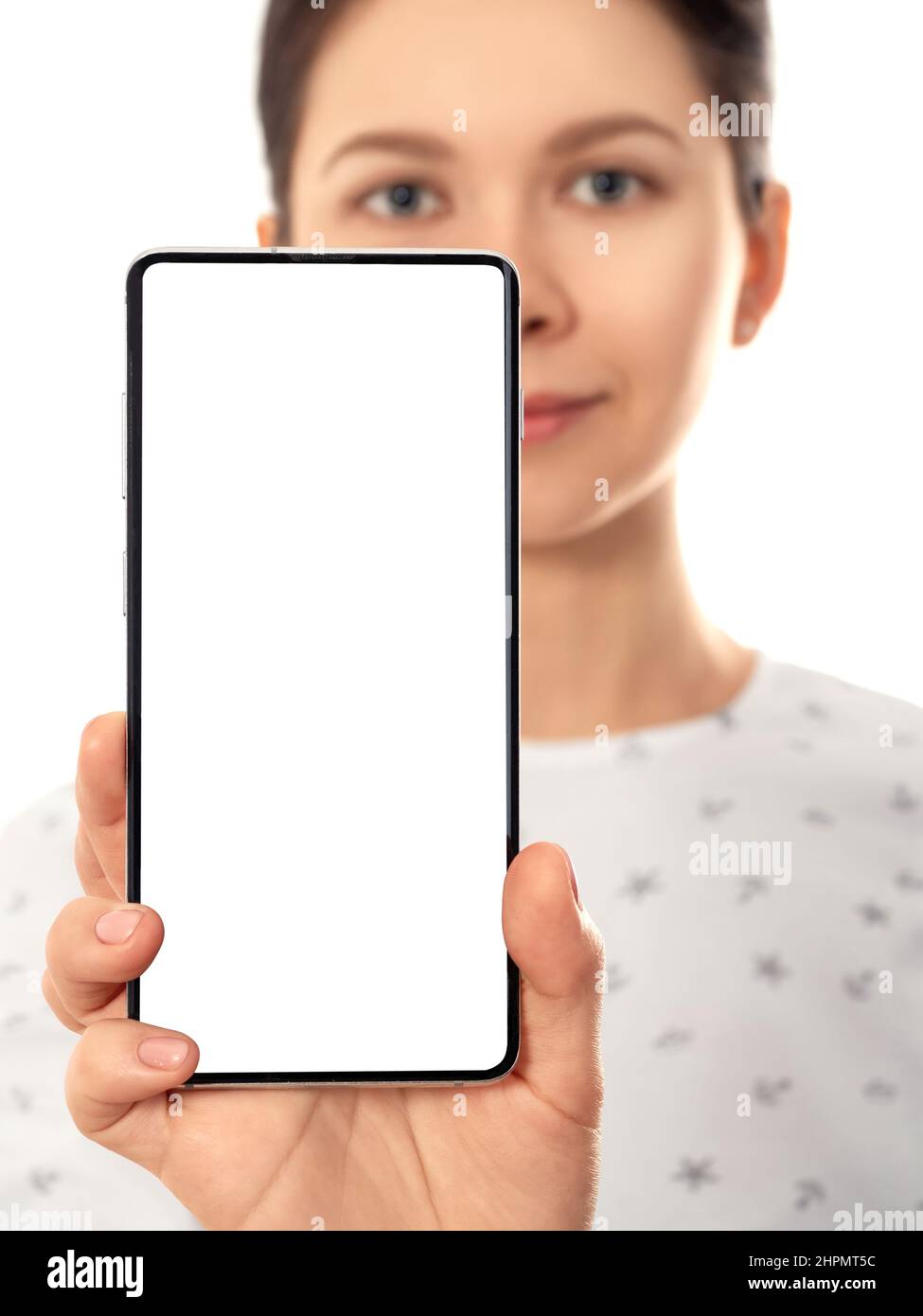 Woman showing her cell phone screen Stock Photo - Alamy