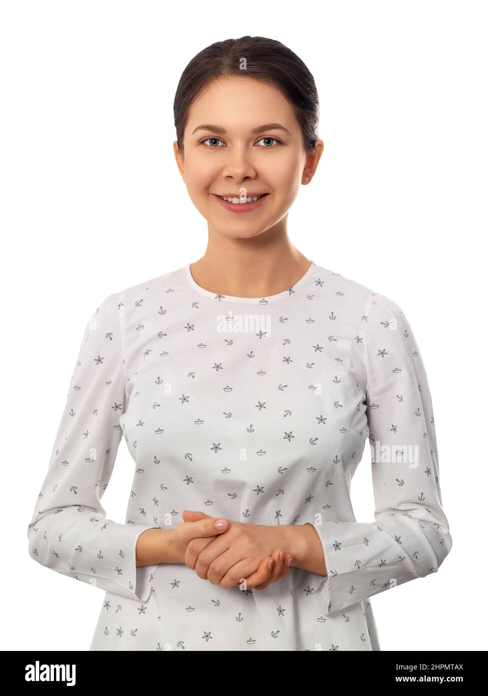 Smiling woman standing over white background Stock Photo - Alamy