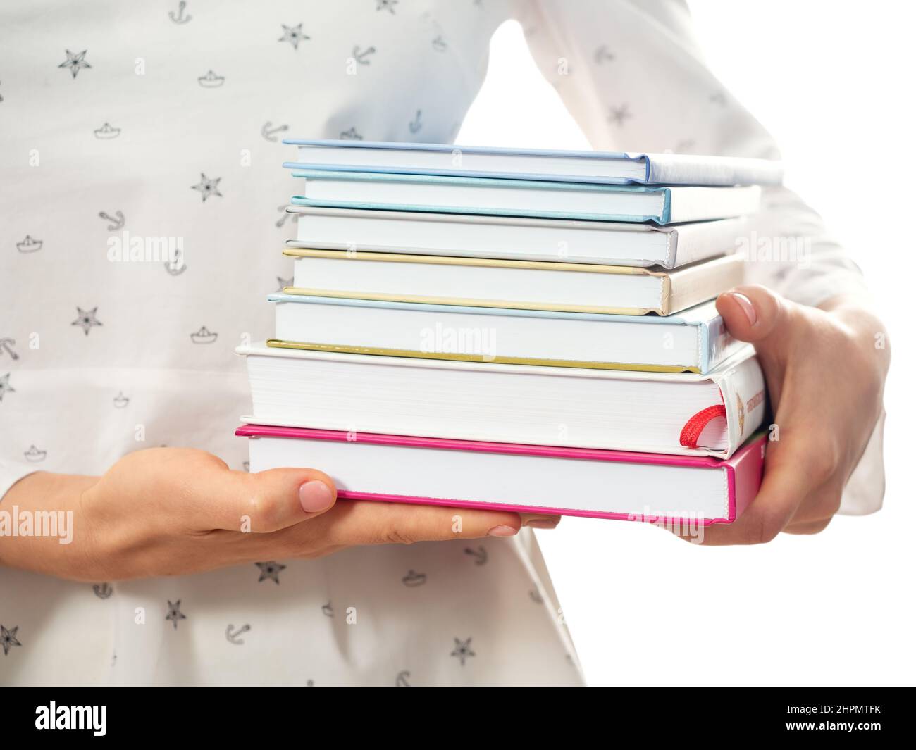 Girl holding stack paper hi-res stock photography and images - Alamy