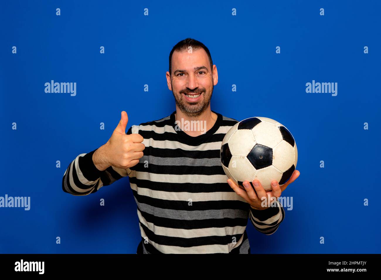 Soccer fan thumb up hi-res stock photography and images - Alamy