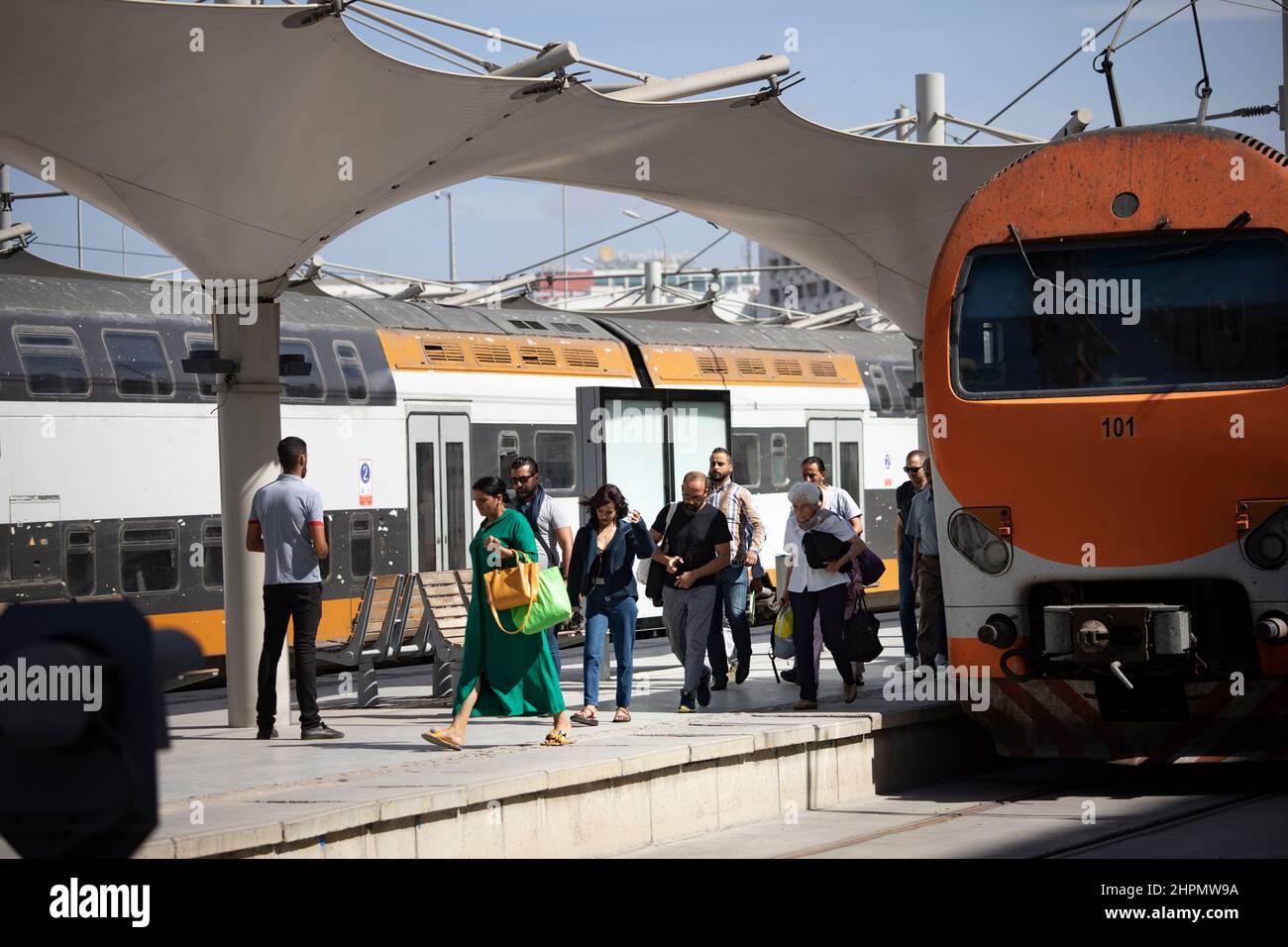 Passengers exit a regional passenger train at Casa Port train station ...