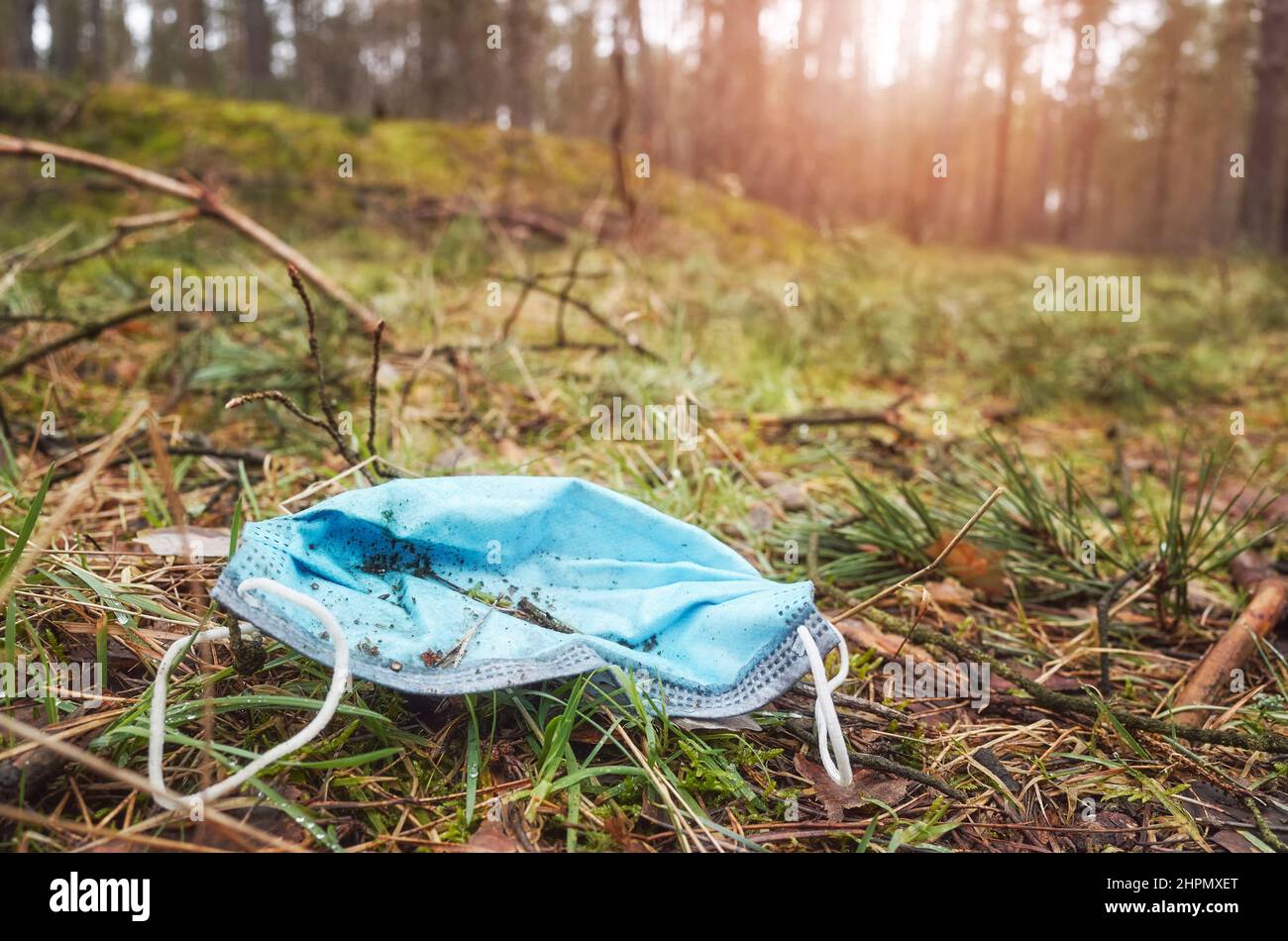 Close up picture of a discarded disposable medical face mask in the ...