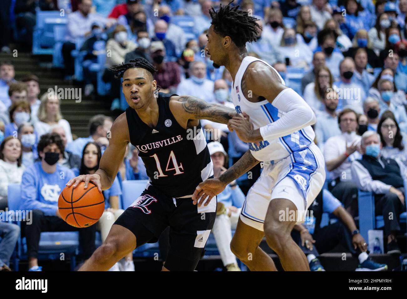 February 21, 2022: Louisville Cardinals guard Dre Davis (14) drives to ...