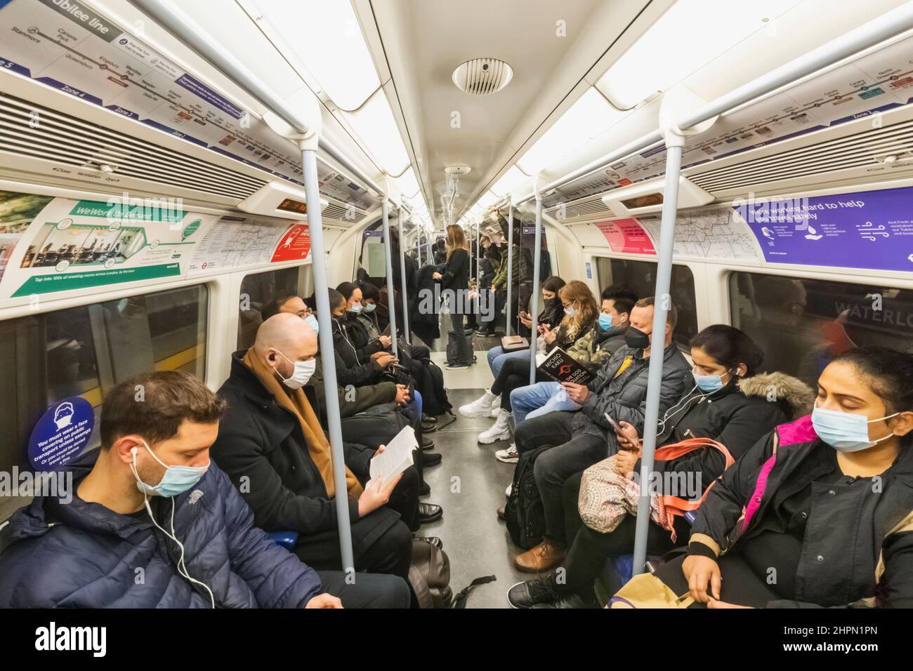 England, London, Subway Passengers Wearing Surgical Masks Stock Photo ...