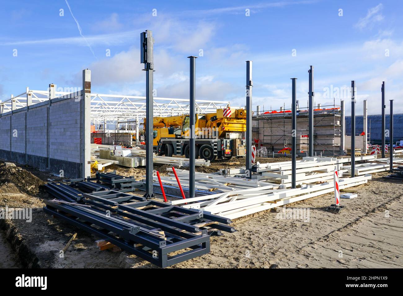 construction of a new modern store building using prefabricated metal ...