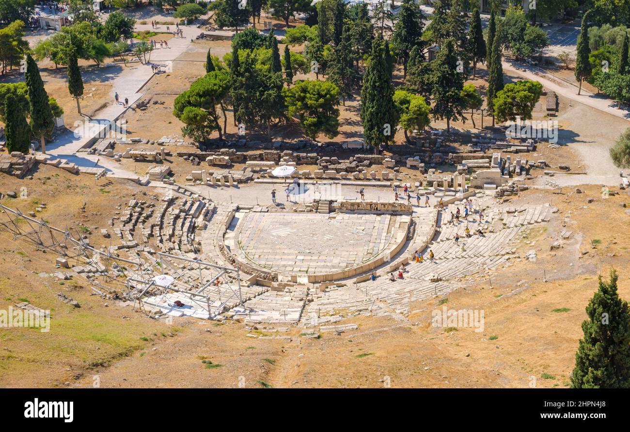 Ancient Theater of Dionysus seen from the hill of Athens Acropolis. Ancient ruins. The Theatre ...