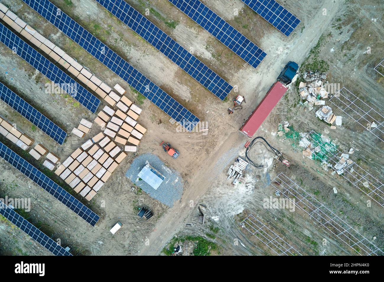 Aerial view of electrical power plant under construction with truck ...