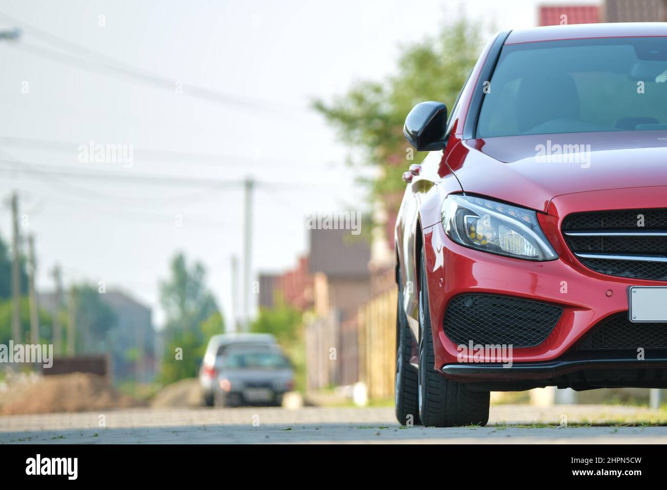 Close up of a car parked on city street side. Urban traffic concept ...