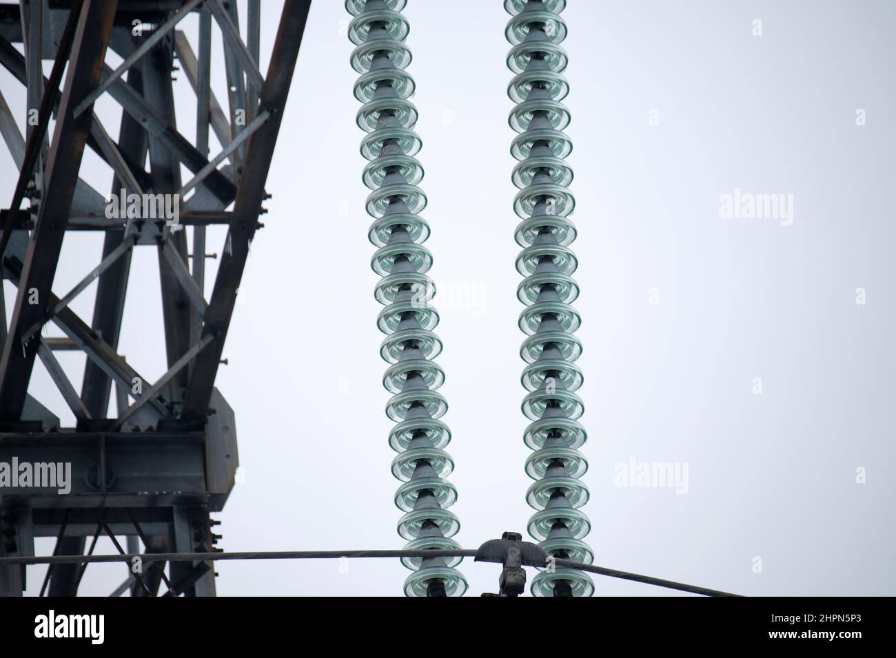 Electric power lines divided by safe guard insulating frame transfening ...