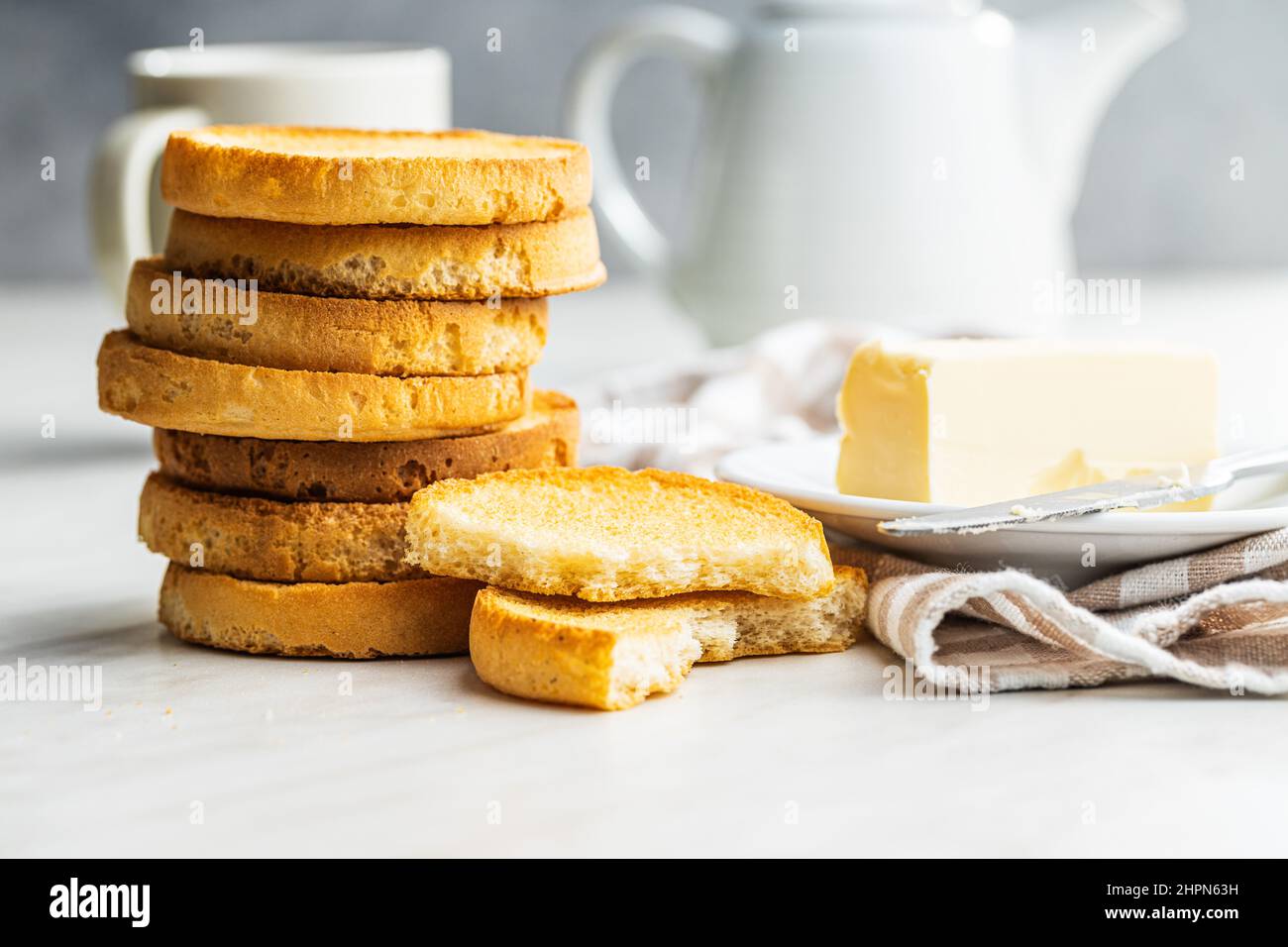 Dietary rusks bread. Crusty biscuits on kitchen table Stock Photo - Alamy