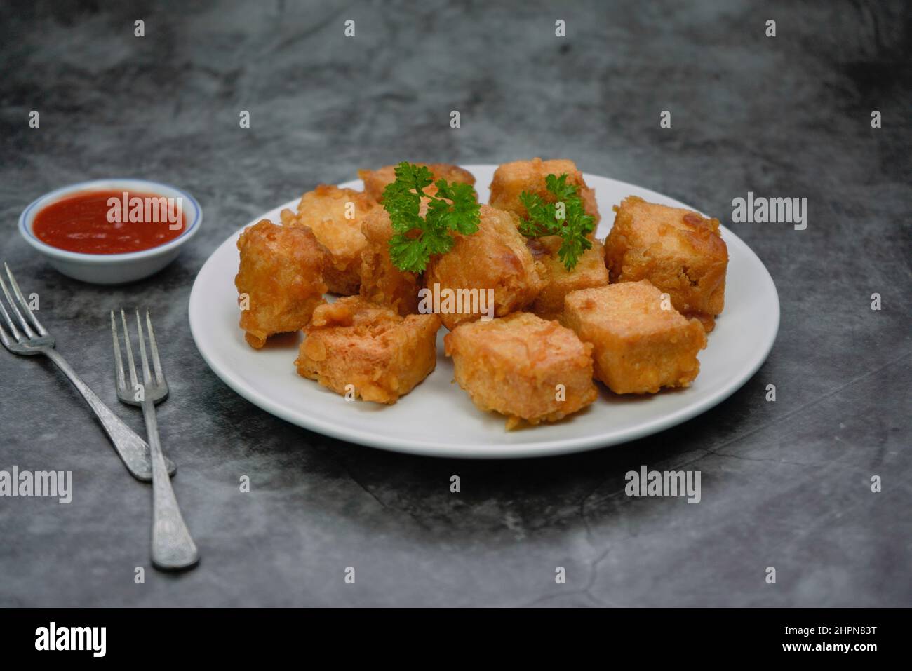 Indonesia Dish Fried Tofu,Tahu Goreng Stock Photo - Alamy