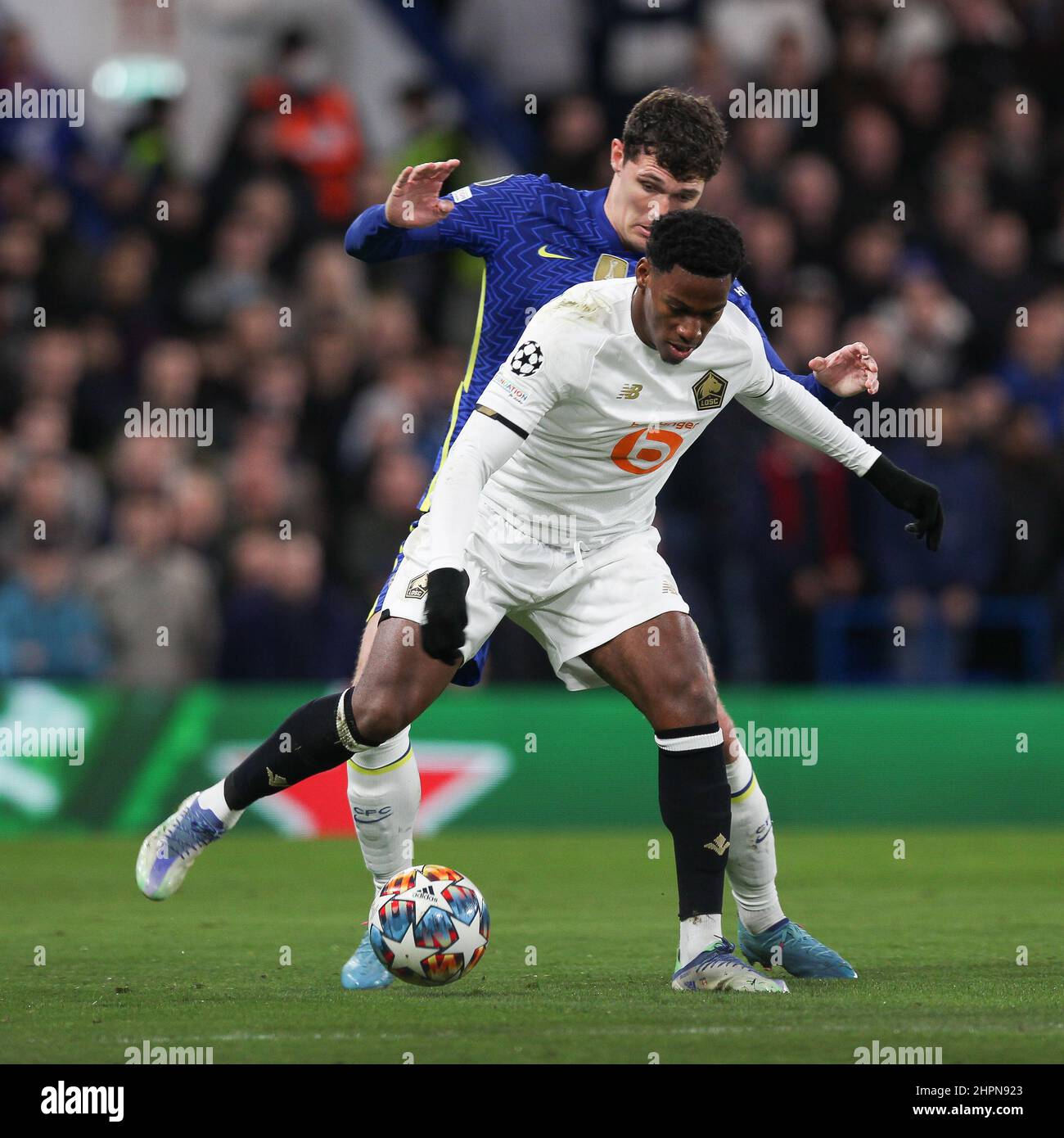 London, UK. 22nd Feb, 2022. Jonathan David of Lille is challenged by ...