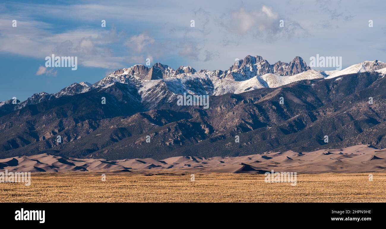 14,000 Foot High Peaks dominate the skyline above, The Great Sand Dunes ...