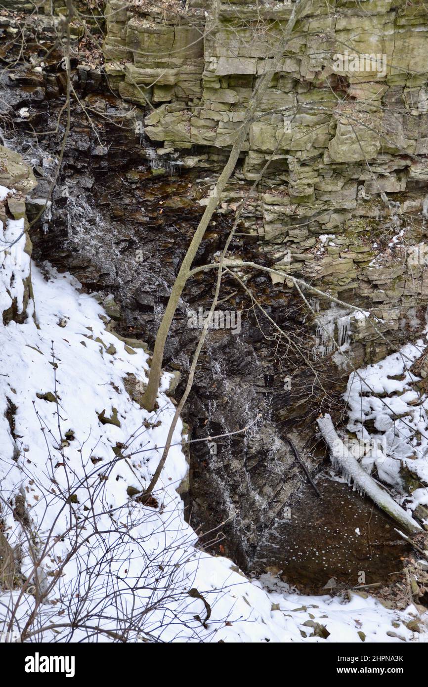 Sanatorium Falls flowing over limestone cliff during Winter Stock Photo ...