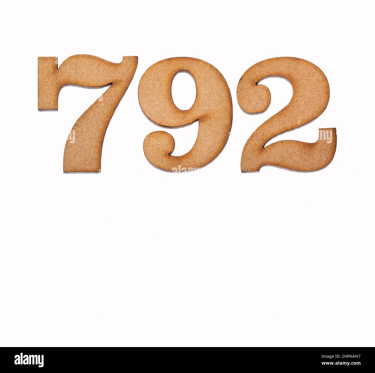 Number 792 - Piece of wood isolated on white background Stock Photo - Alamy