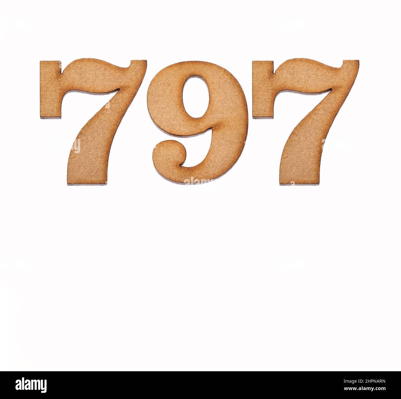 Number 797 in wood, isolated on white background Stock Photo - Alamy