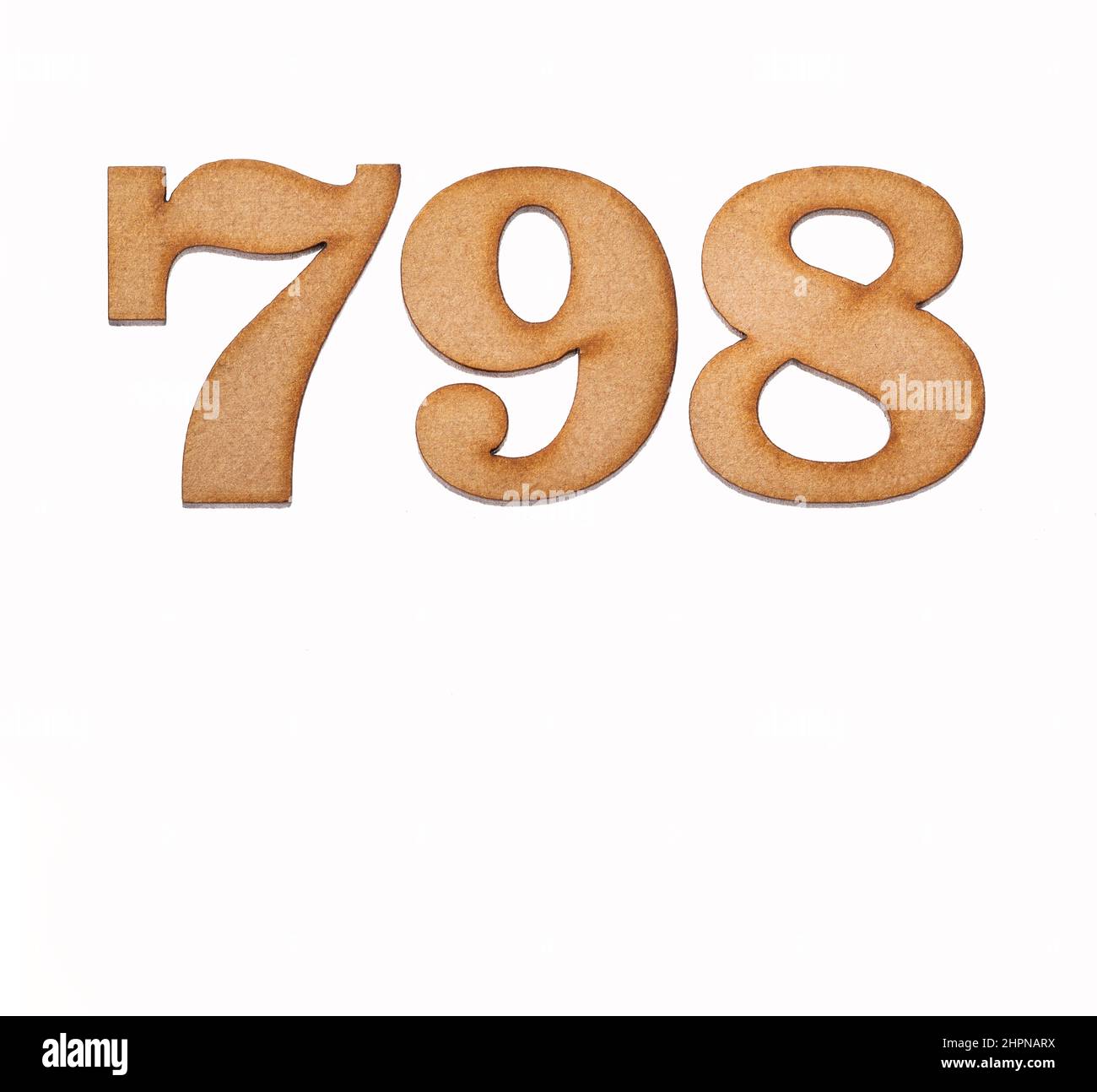 Number 798 - Piece of wood isolated on white background Stock Photo - Alamy
