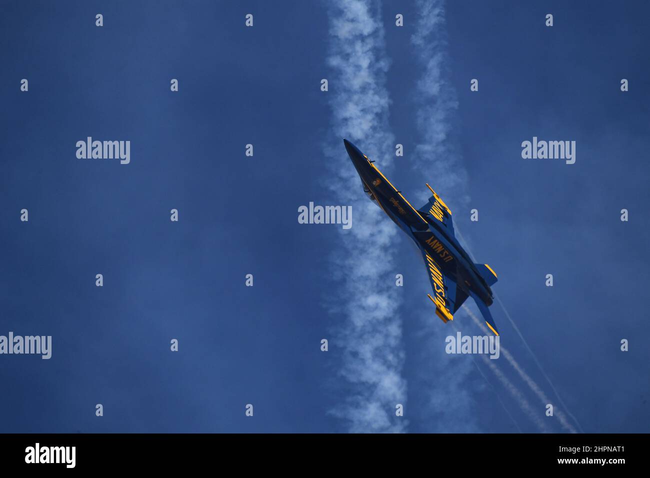 Blue Angel 5 banks hard exiting air show box during practice at NAF El ...