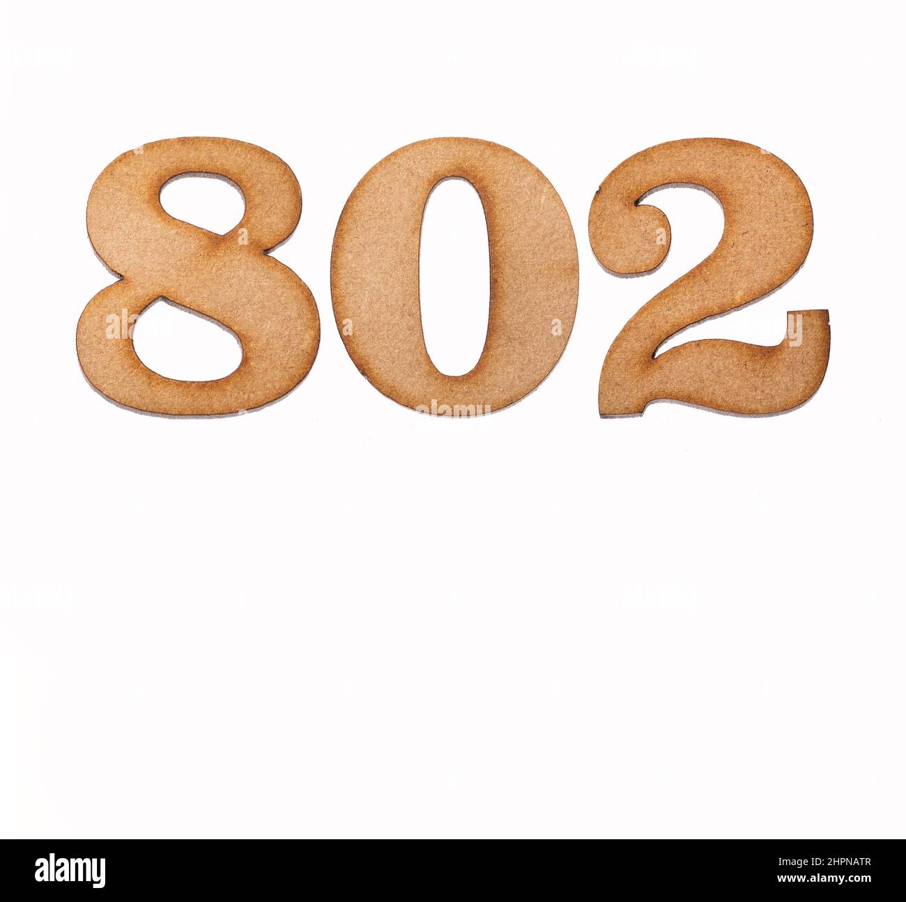 Number 802 - Piece of wood isolated on white background Stock Photo - Alamy
